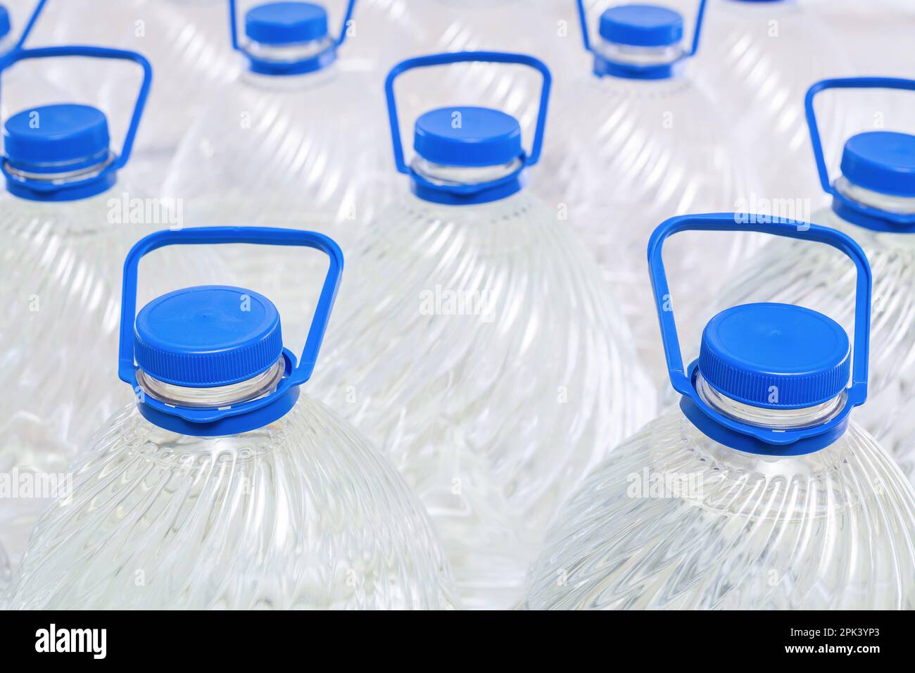 Water in plastic bottles on a white background, isolated Stock Photo ...
