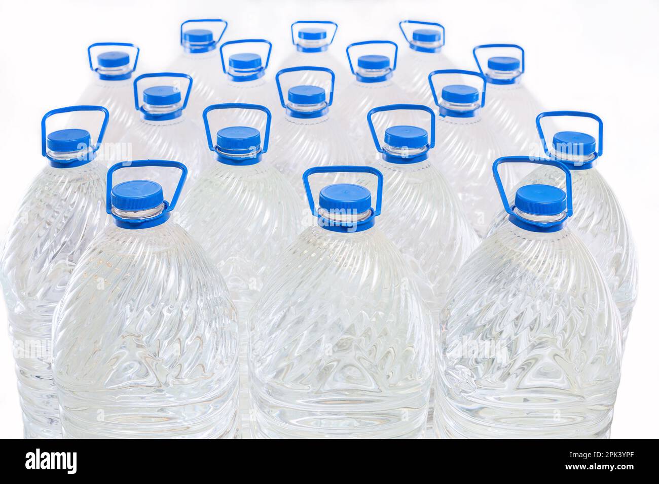 Water in plastic bottles on a white background, isolated Stock Photo ...