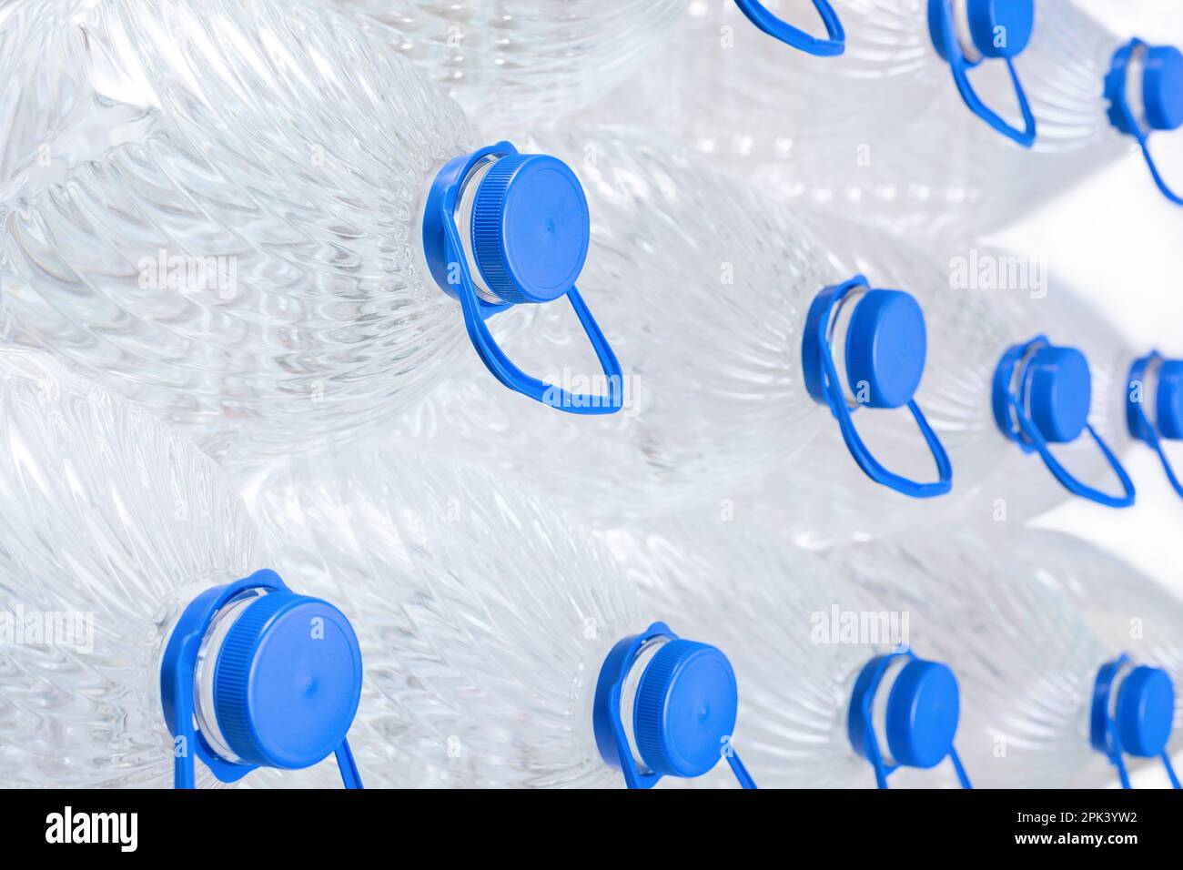 Water in plastic bottles on a white background, isolated Stock Photo ...