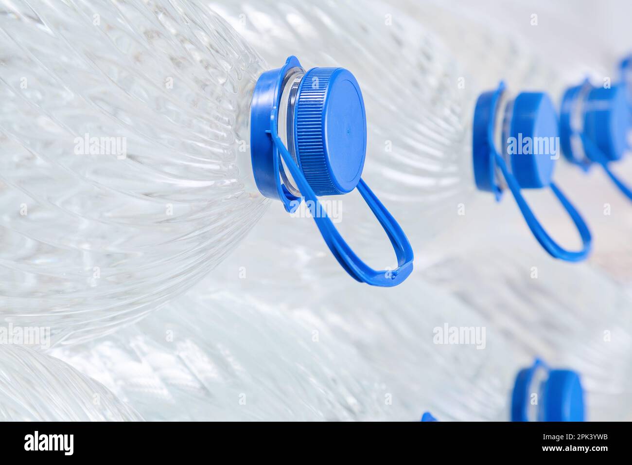 Water in plastic bottles on a white background, isolated Stock Photo ...