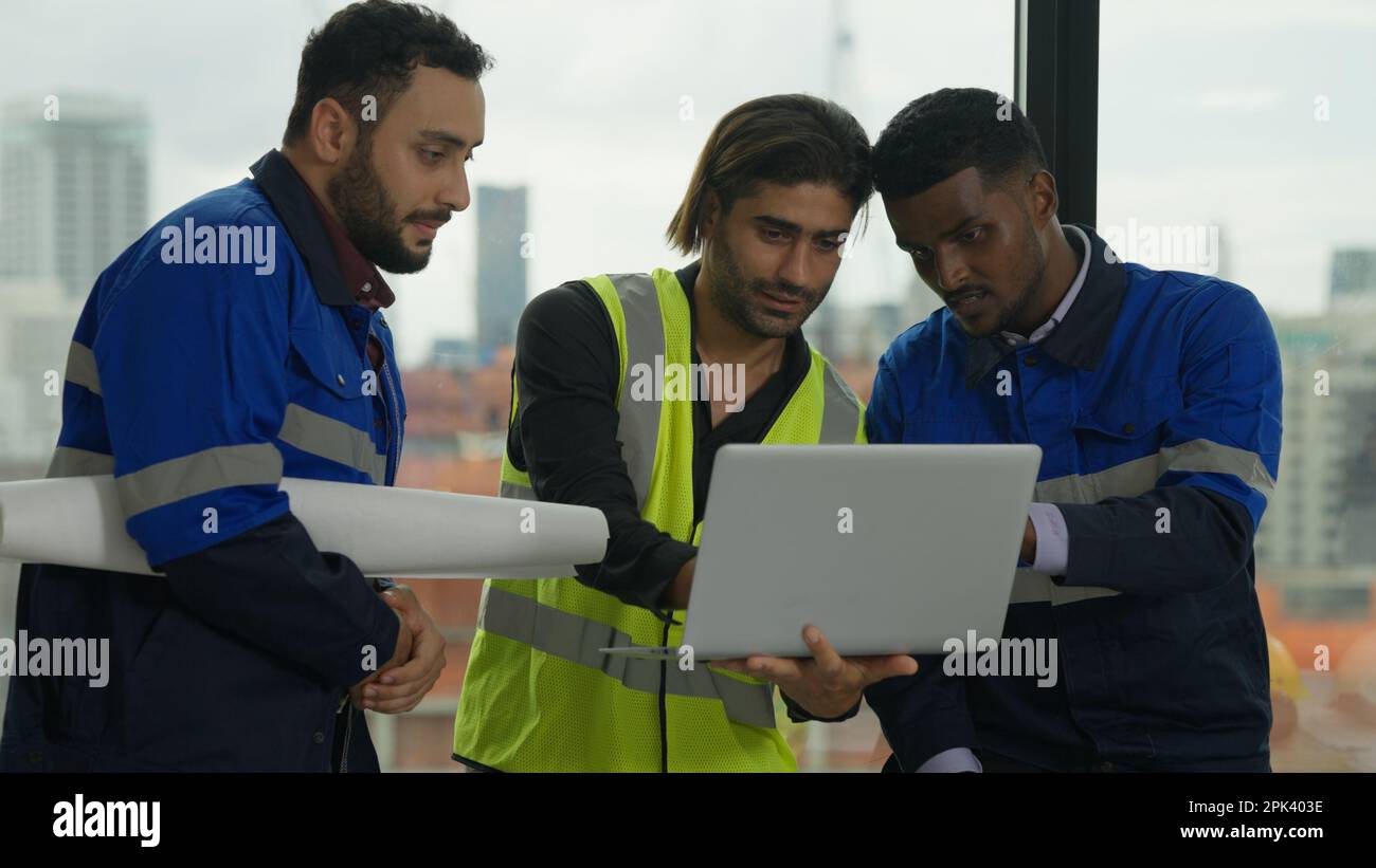 Construction engineer discussing and brainstorming with architects ...