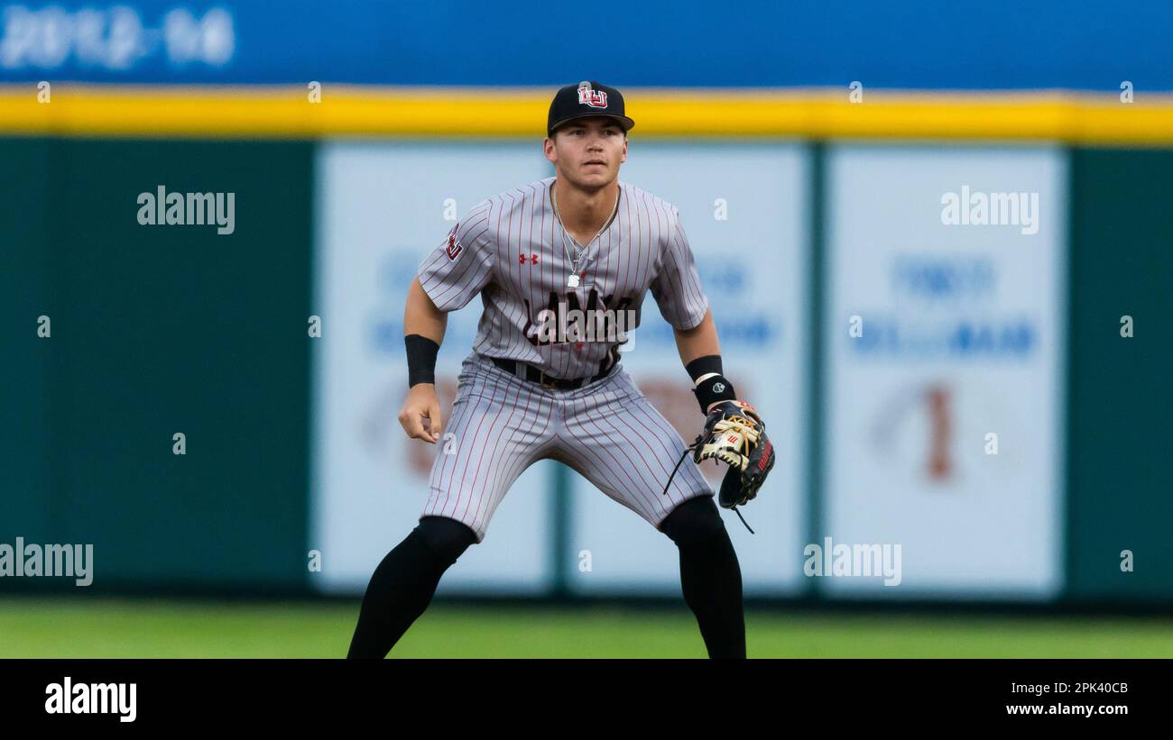 Lamar University junior infielder Kanin Dodge stands ready to catch a ...