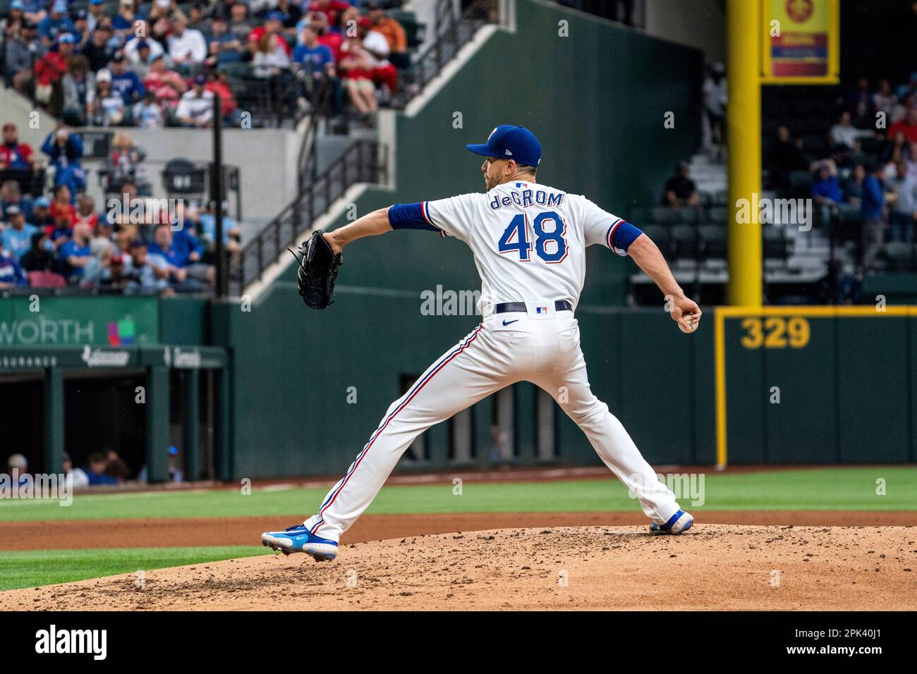 Texas Rangers starting pitcher Jacob deGrom works against the ...