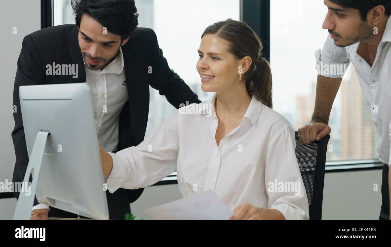 Happy employees working together at high building office Stock Photo ...
