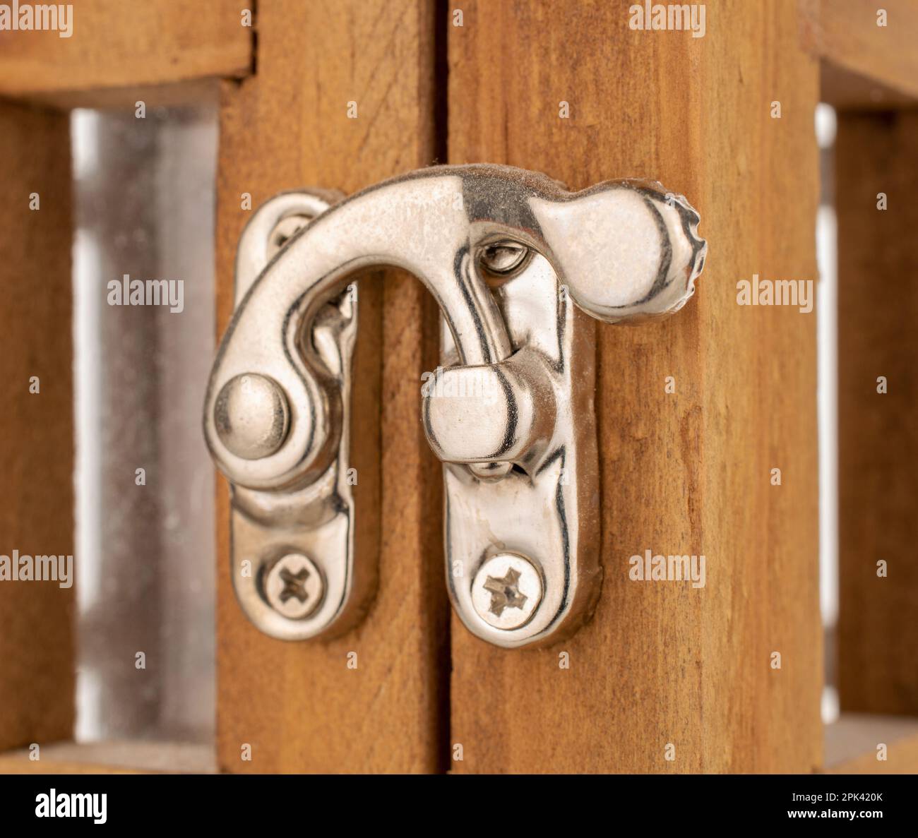 One Decorative metal lock, macro, on a wooden door Stock Photo - Alamy