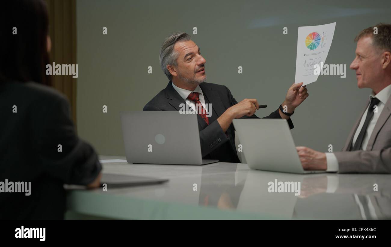 Professional businessman leader meeting with co-worker team in meeting ...