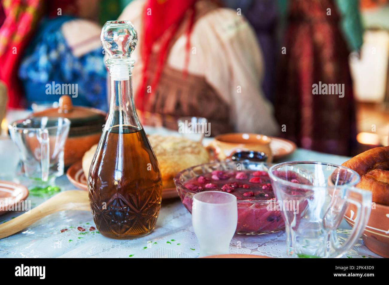 Alcohol Tincture on the table with authentic slavic snacks. Feast Stock ...