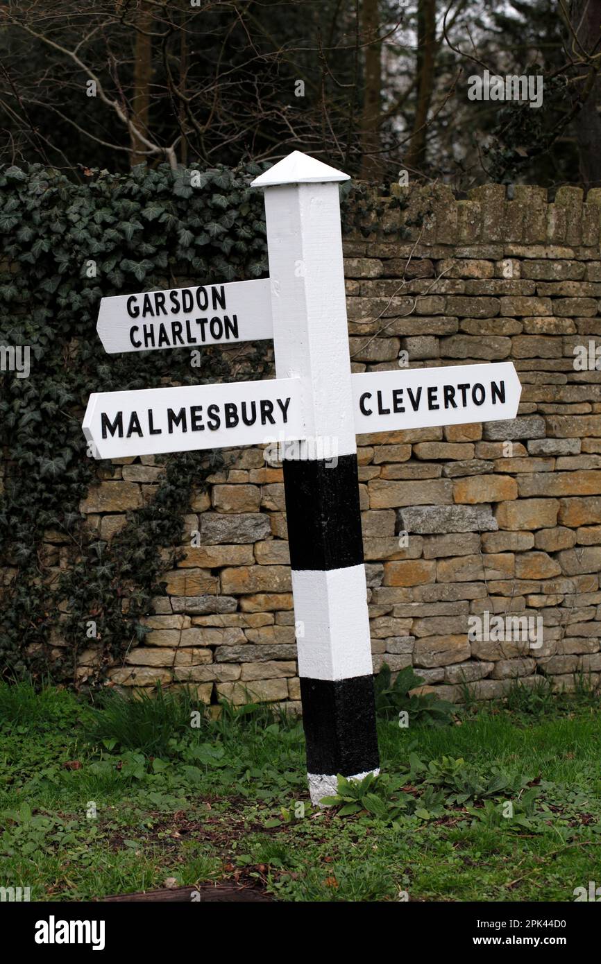 Black and white Wiltshire road direction sign for Malmesbury, Charlton ...
