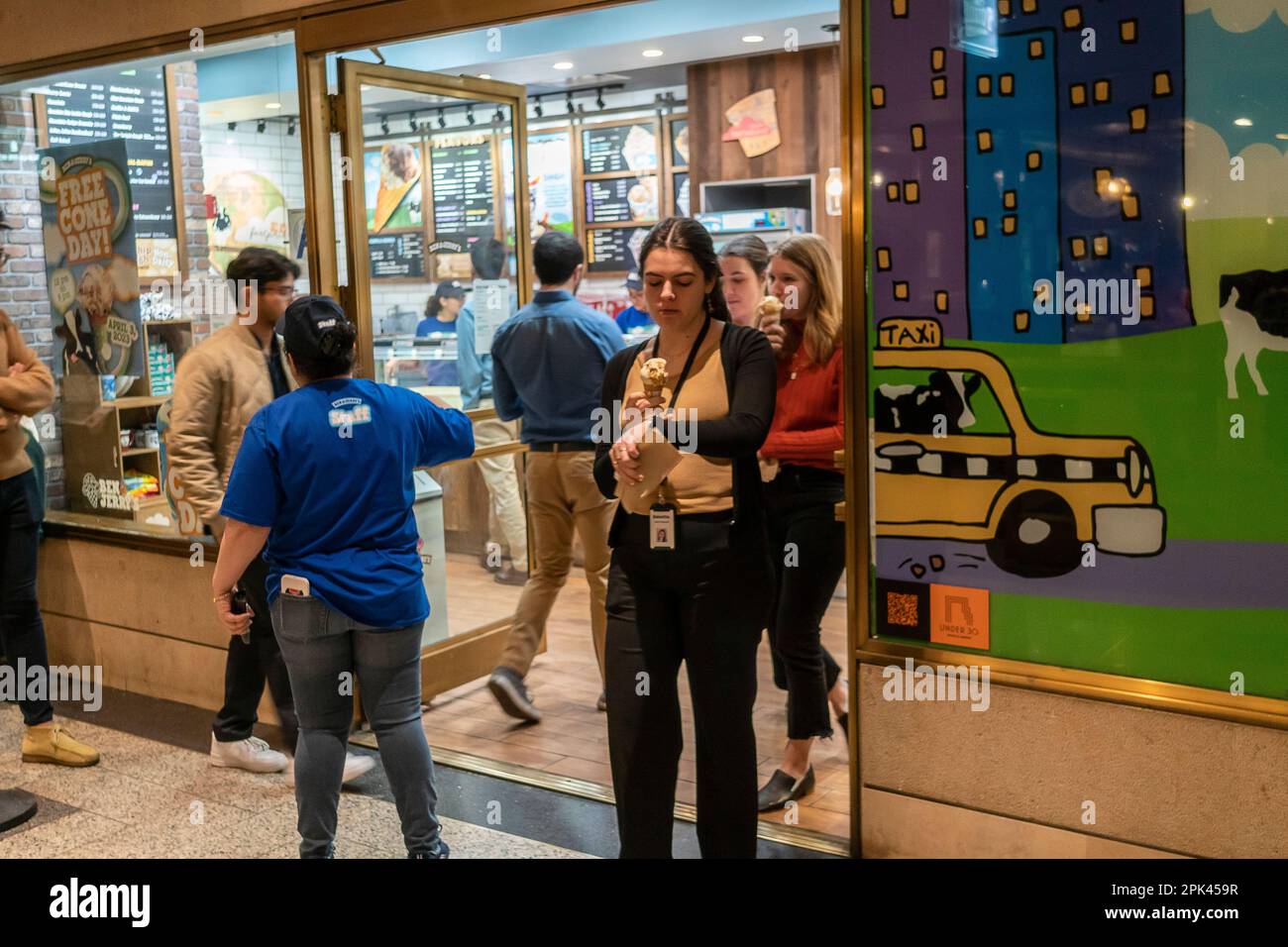 Workers in Rockefeller Center leave the Ben & Jerry's ice cream store ...
