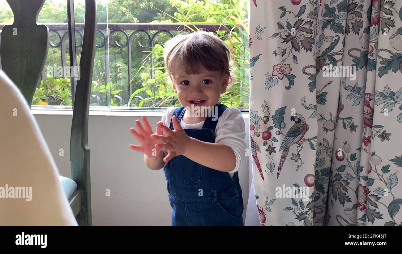 Adorable baby clapping hands, excited happy toddler claps Stock Photo ...