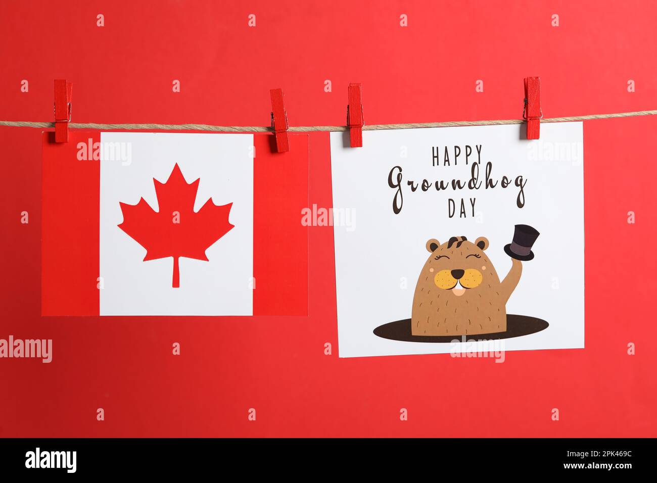 Happy Groundhog Day greeting card and Canada flag hanging on red ...
