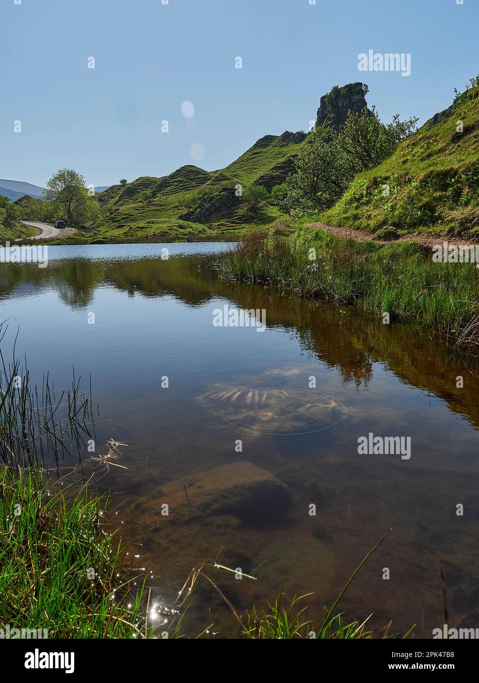 little pond in the landscape around fairy glen on the isle of skye in ...