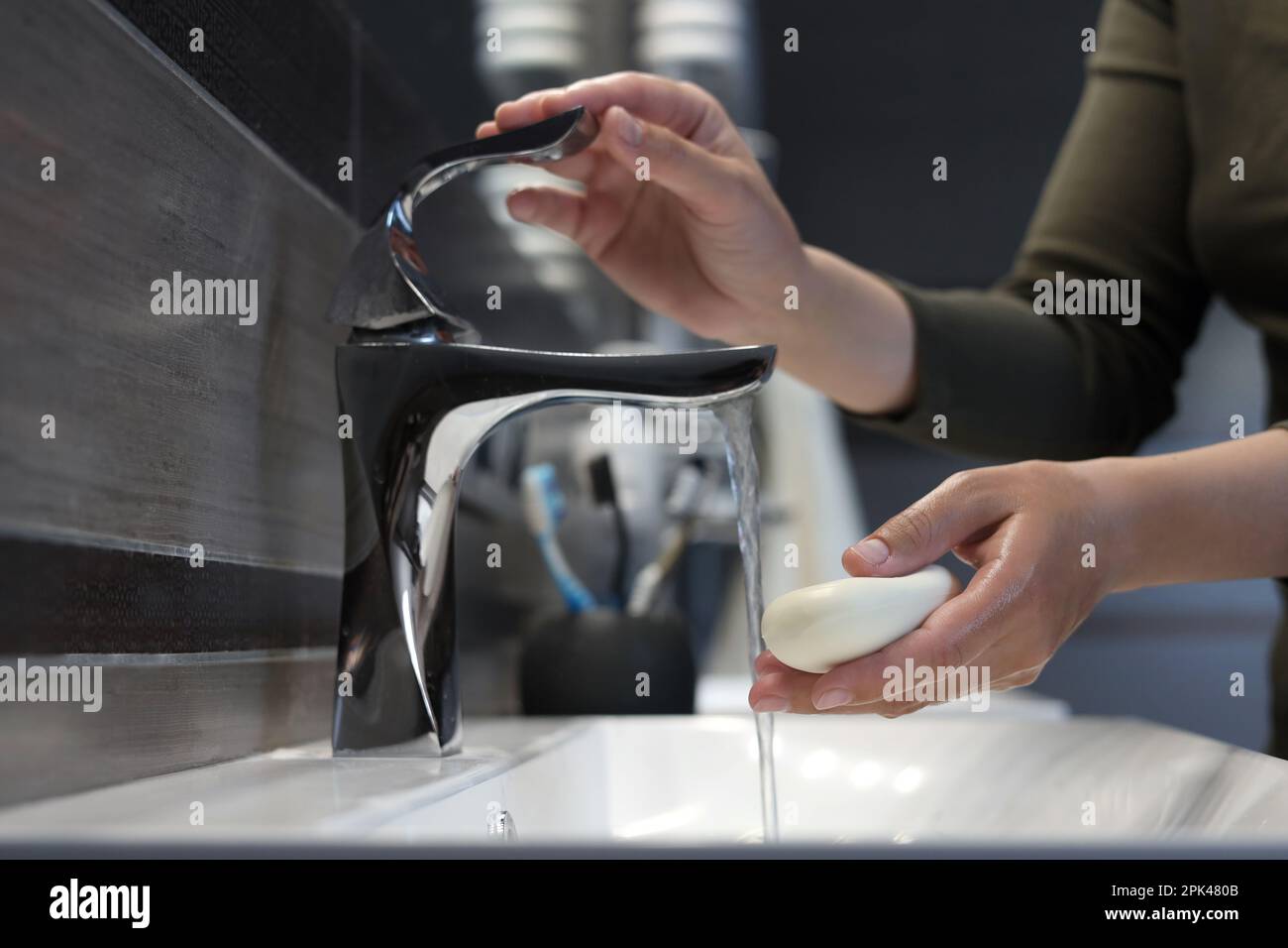 Woman washing hands bar soap hi-res stock photography and images - Alamy