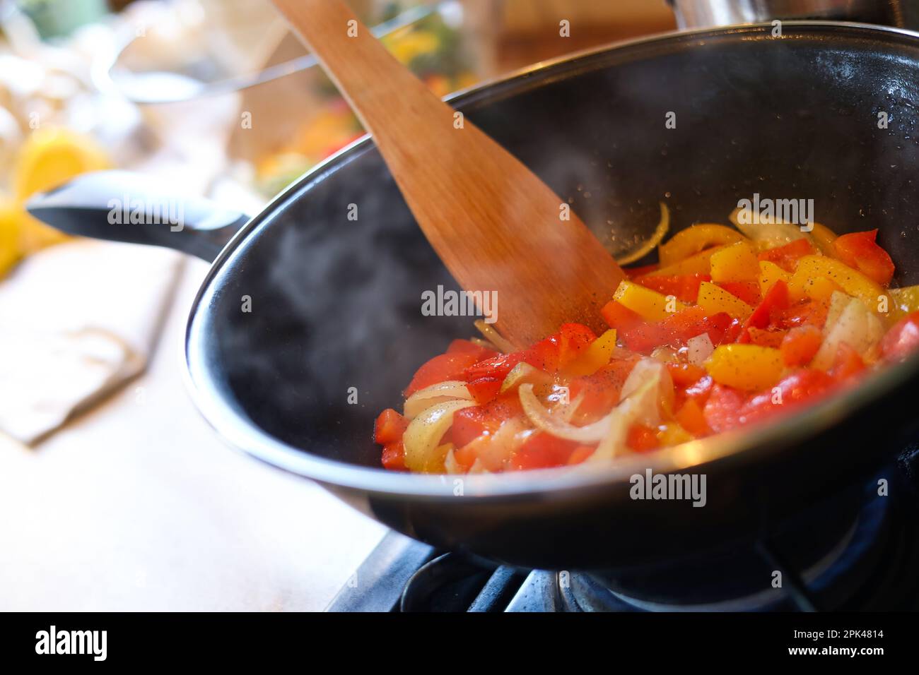 Frying vegetables in pan steam hi-res stock photography and images - Alamy