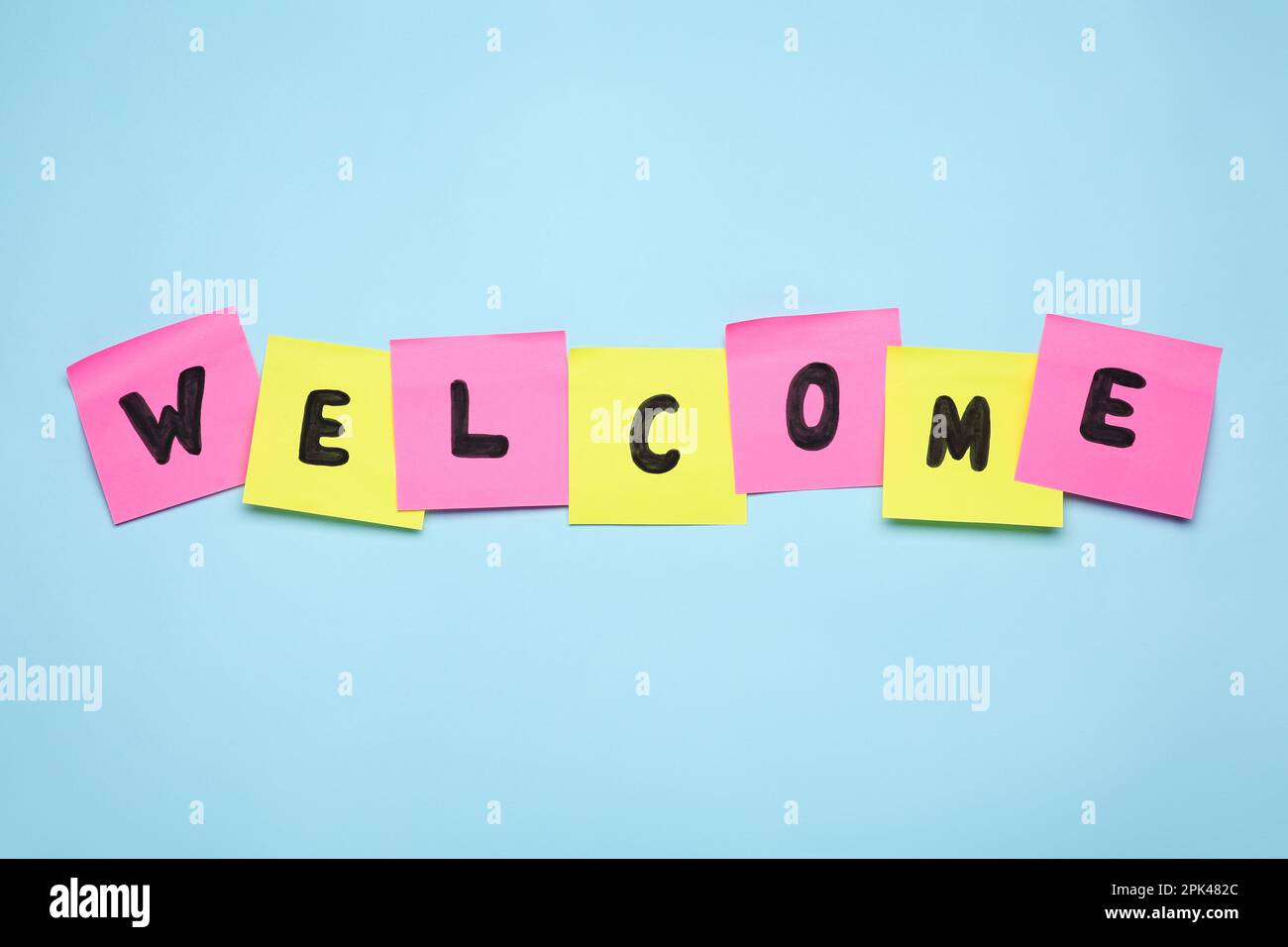 Word Welcome made of paper notes on light blue background, top view ...