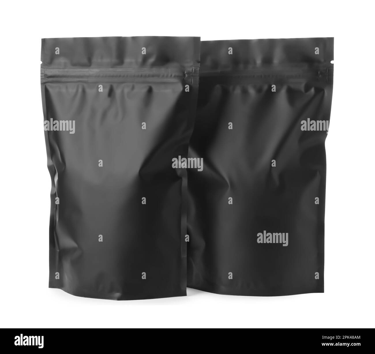 Two blank foil packages isolated on white Stock Photo - Alamy