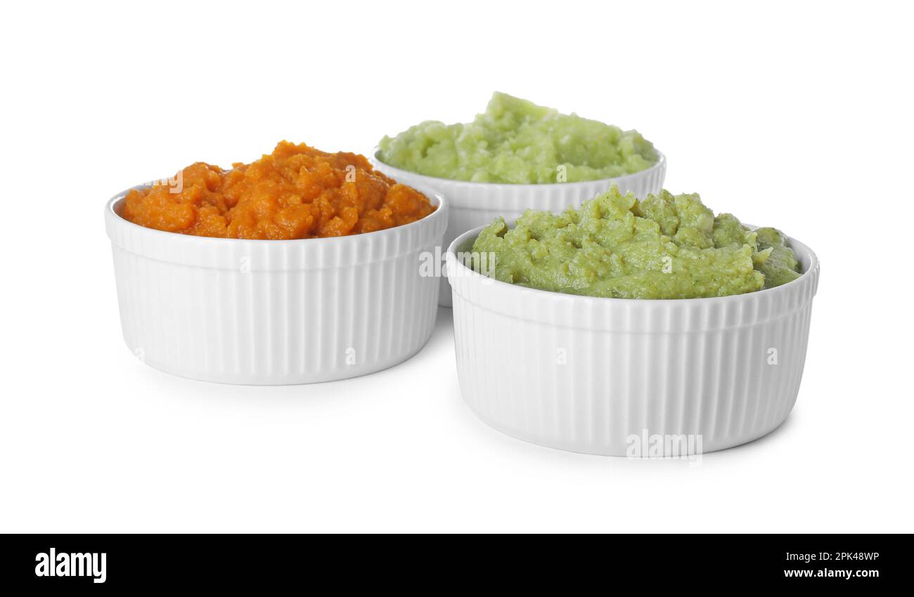 Different delicious puree in bowls on white background. Healthy food ...