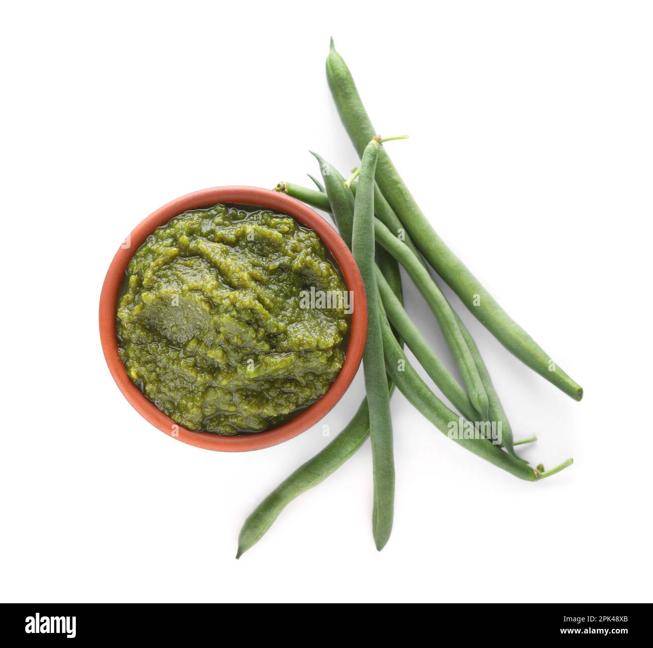 Delicious vegetable puree with green beans on white background, top ...