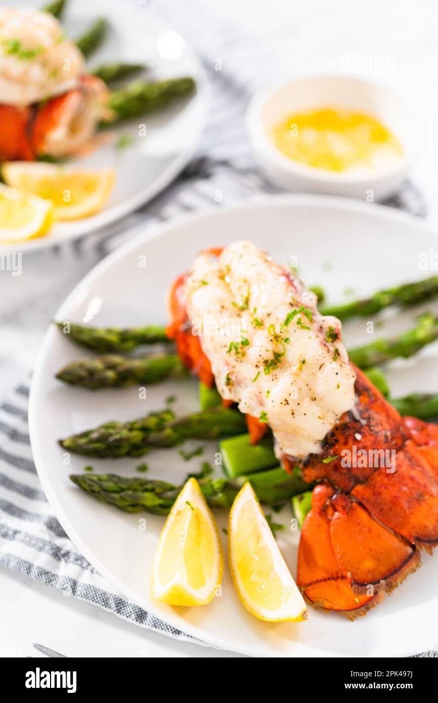 Garlic lobster tails Stock Photo - Alamy