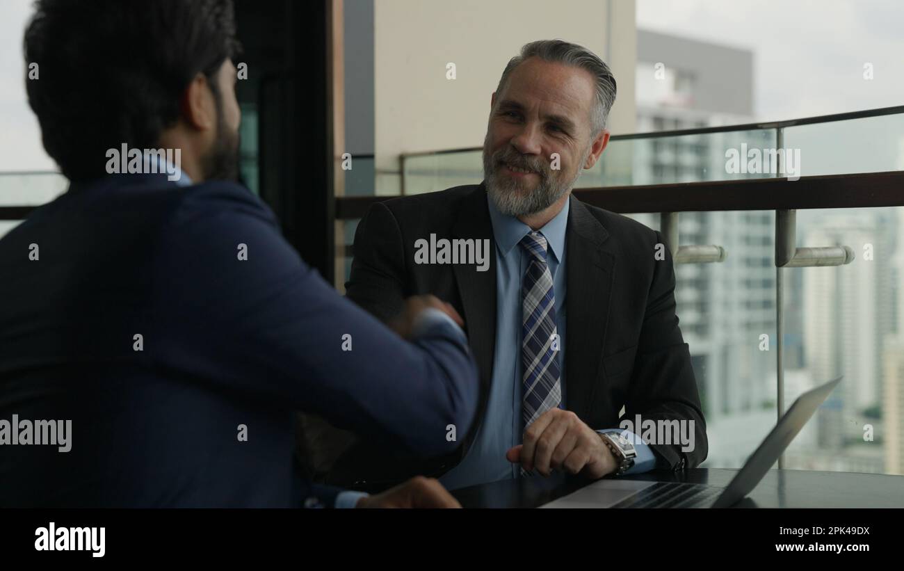 Business people shacking hands together showing successful contract ...