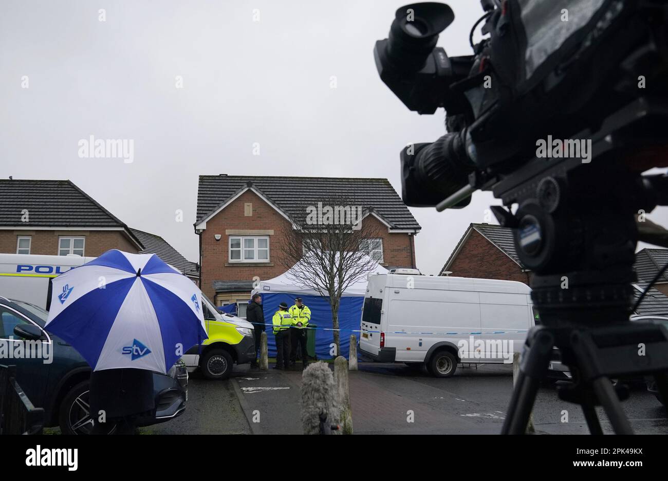 Officers from Police Scotland and media outside the home of former ...