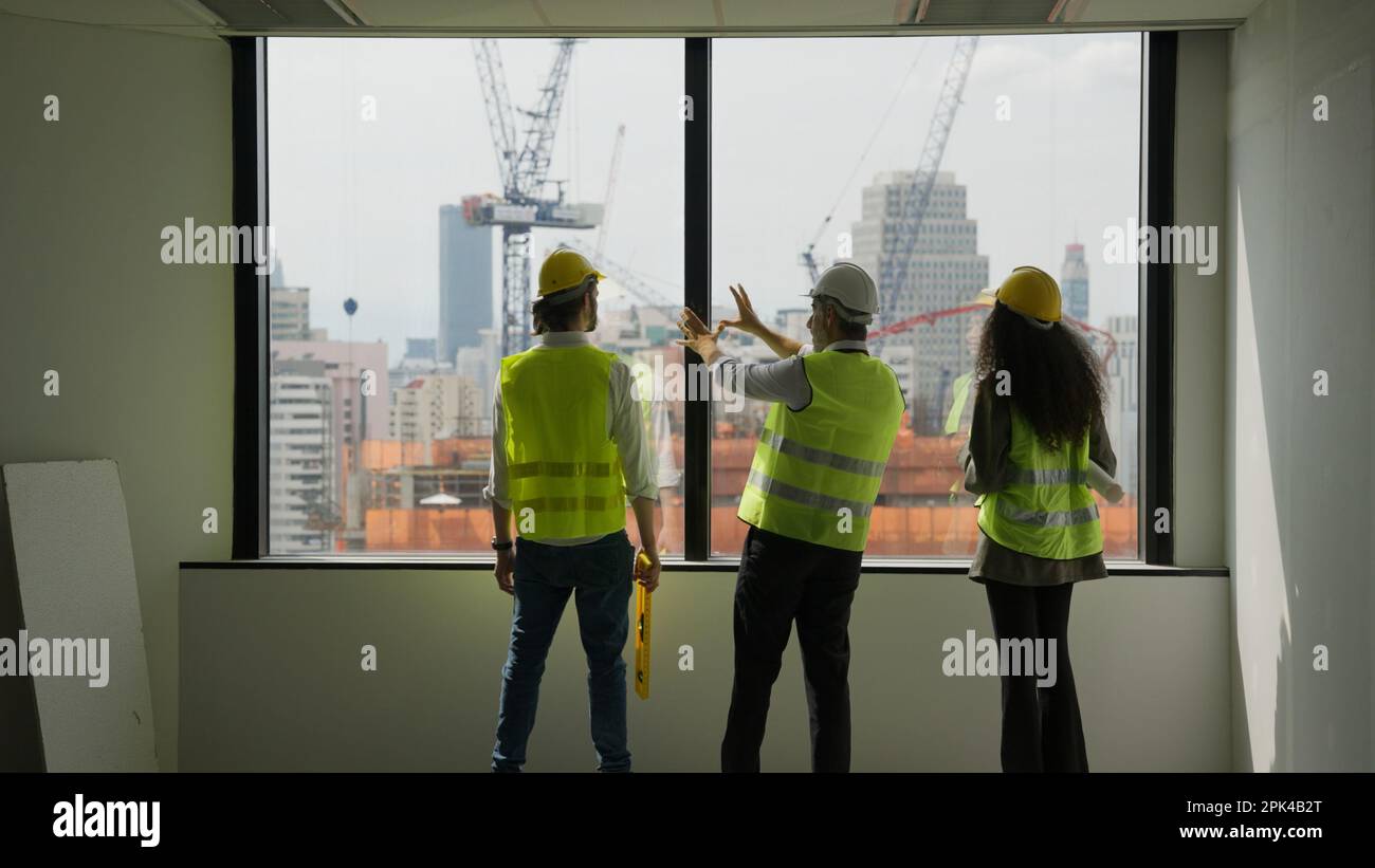 Group of professional civil engineers team working on new building ...