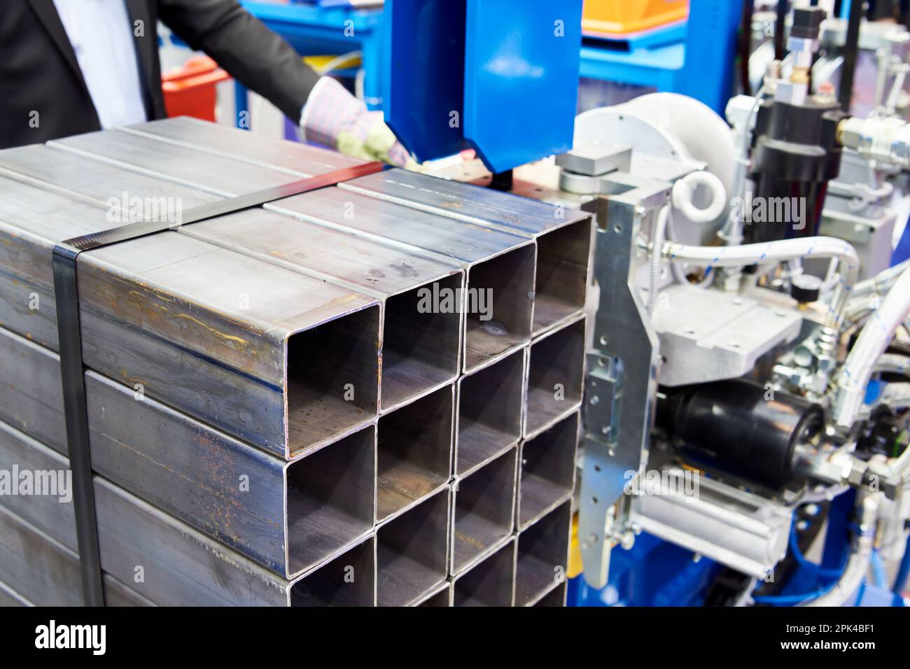 Machine for packing metal parts Stock Photo - Alamy