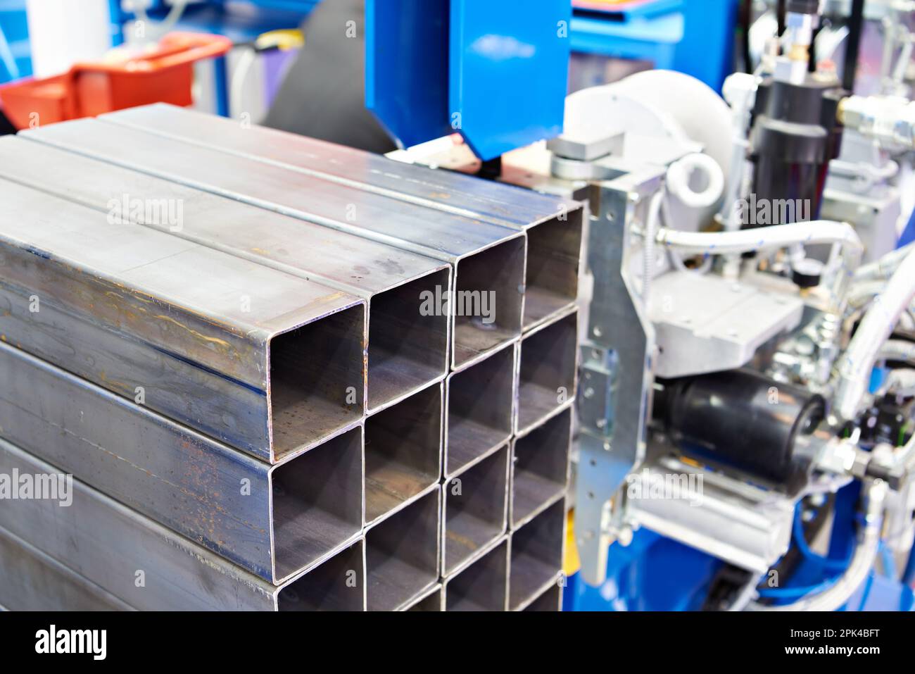 Machine for packing metal parts Stock Photo - Alamy
