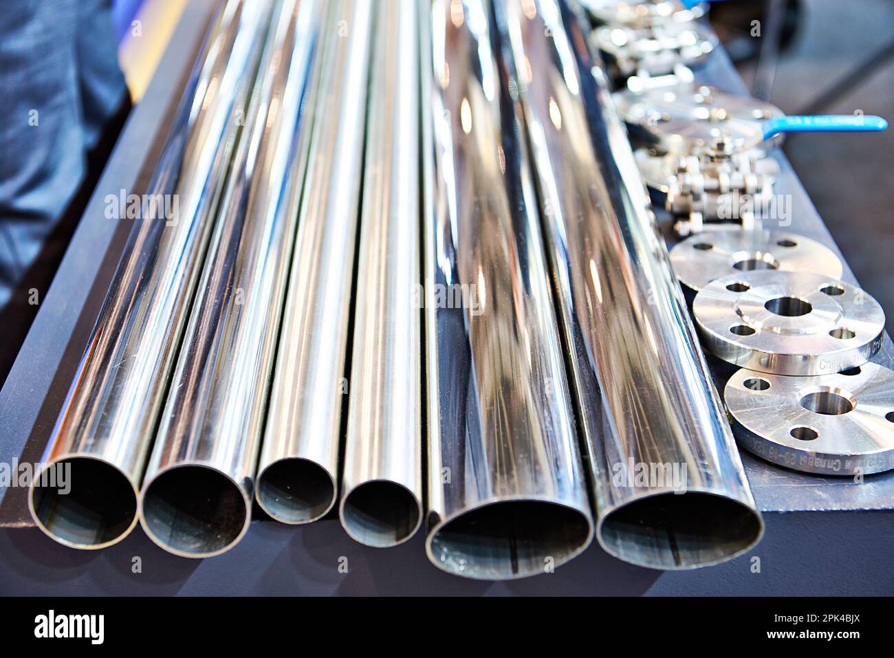 Steel pipes in stack closeup Stock Photo - Alamy