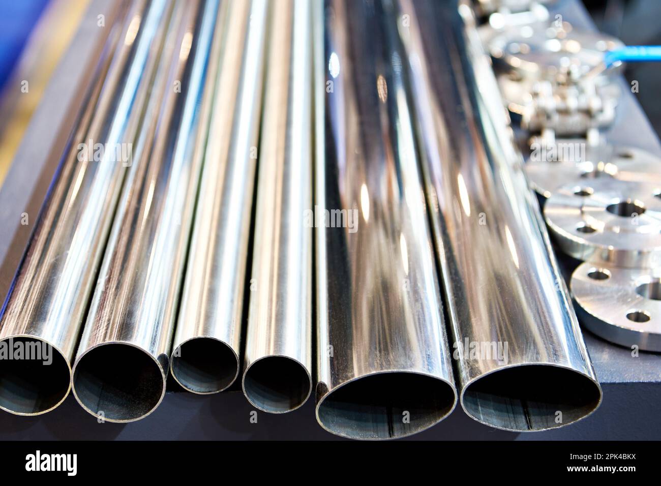 Steel pipes in stack closeup Stock Photo - Alamy
