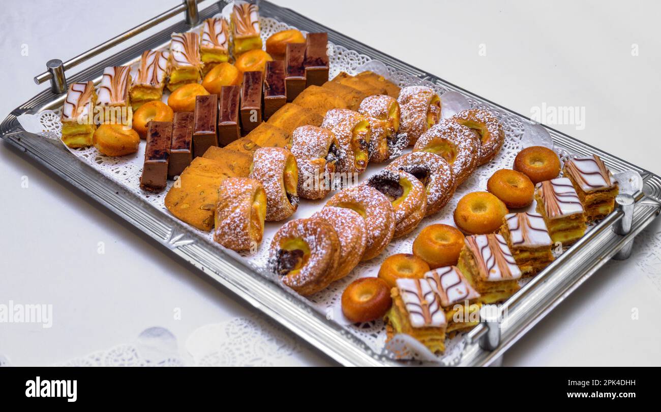French pastries on display in patisserie Stock Photo - Alamy
