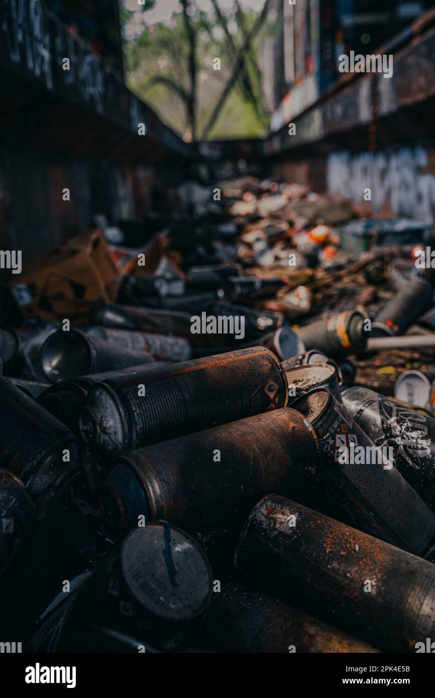 A close-up shot of rusty metal cans in a landfill Stock Photo - Alamy