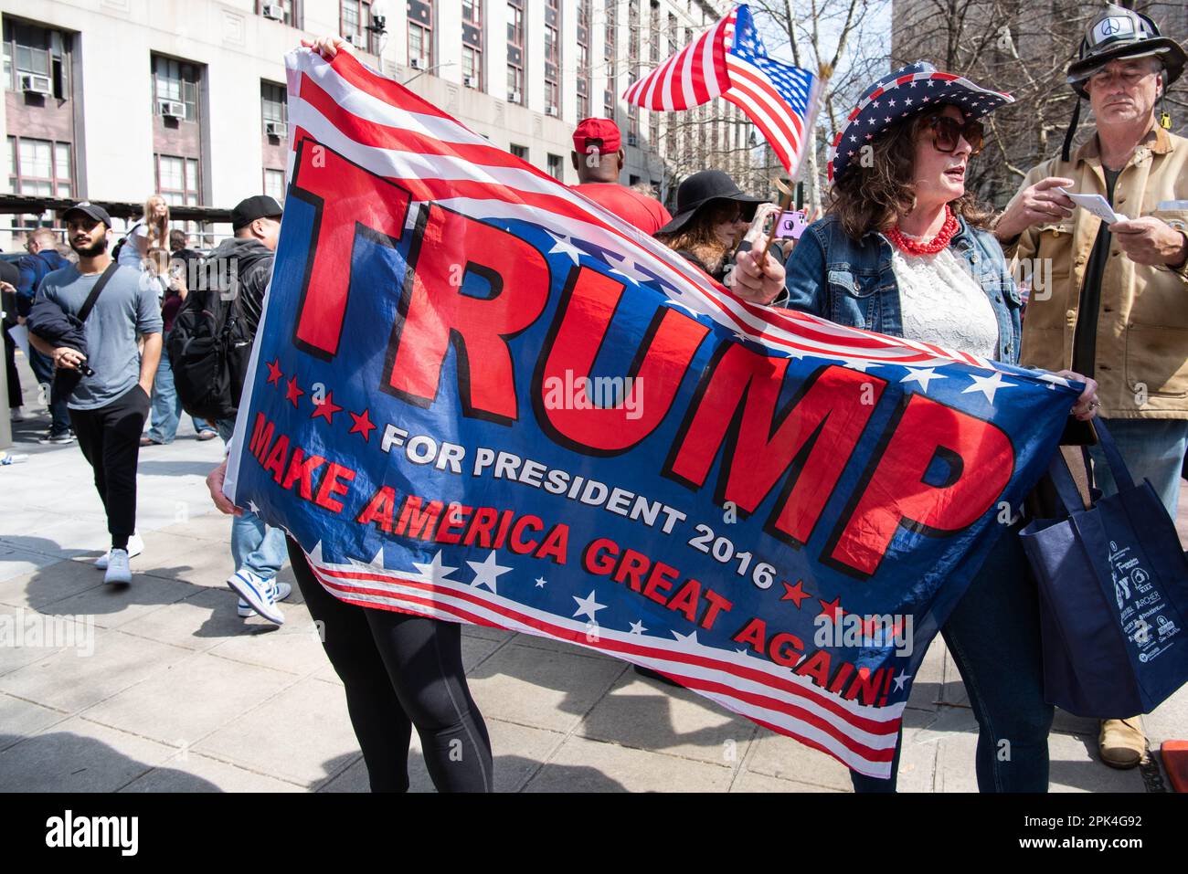 Pro Trump protestors holding a Trump for president 2016 flag outside ...