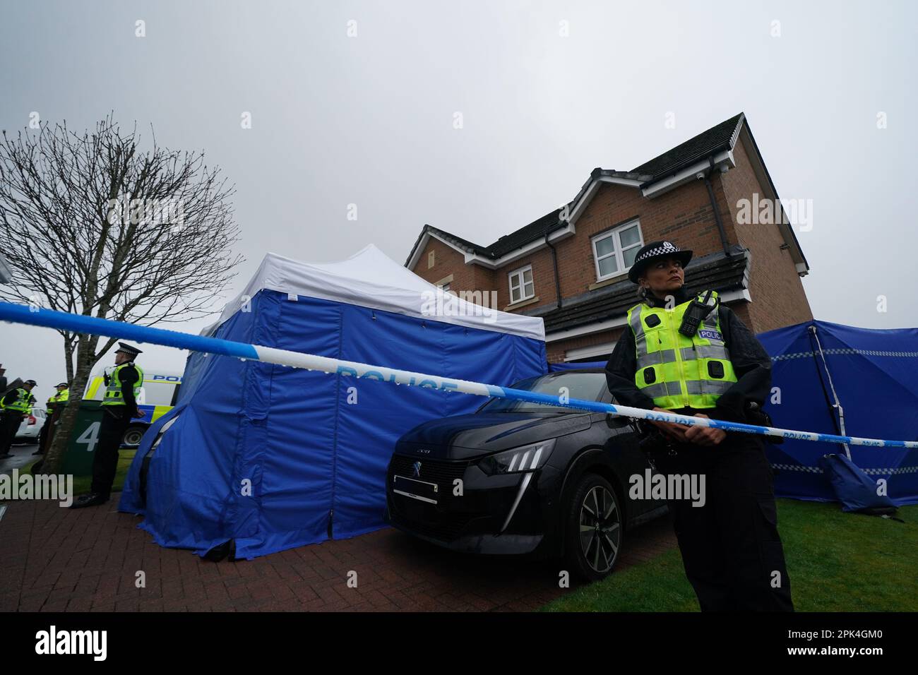 Officers from Police Scotland outside the home of former chief ...