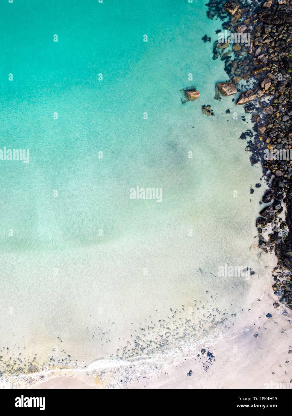 Aerial drone view of Port of Stoth on the Isle of Lewis. Turquoise sea ...