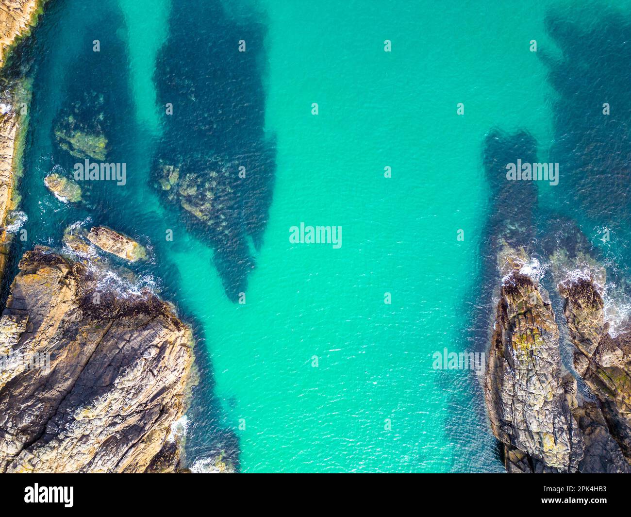 Aerial drone view of Port of Stoth on the Isle of Lewis. Turquoise sea ...