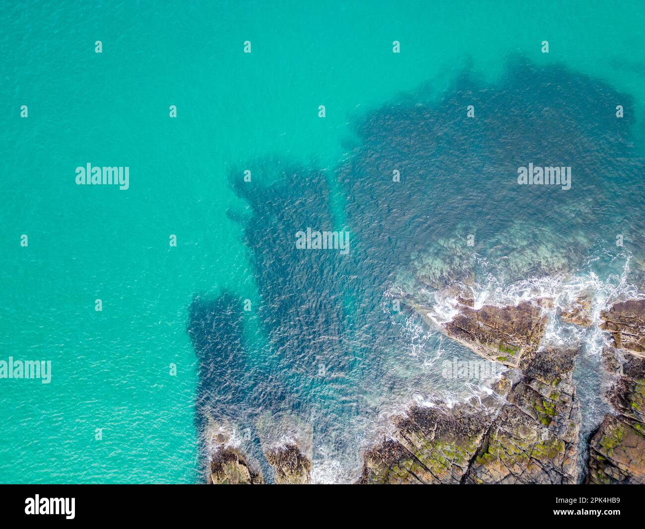 Aerial drone view of Port of Stoth on the Isle of Lewis. Turquoise sea ...