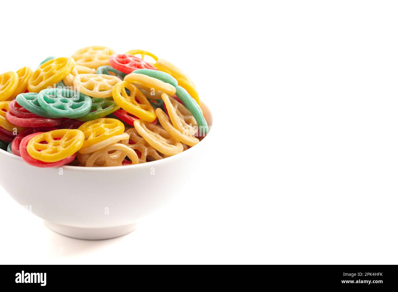Uncooked Wheel Fryums Isolated on a White Background Stock Photo - Alamy