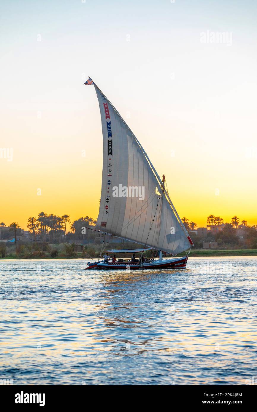Feluccas On The River Nile At Sunset, Luxor, Egypt, North East Africa ...