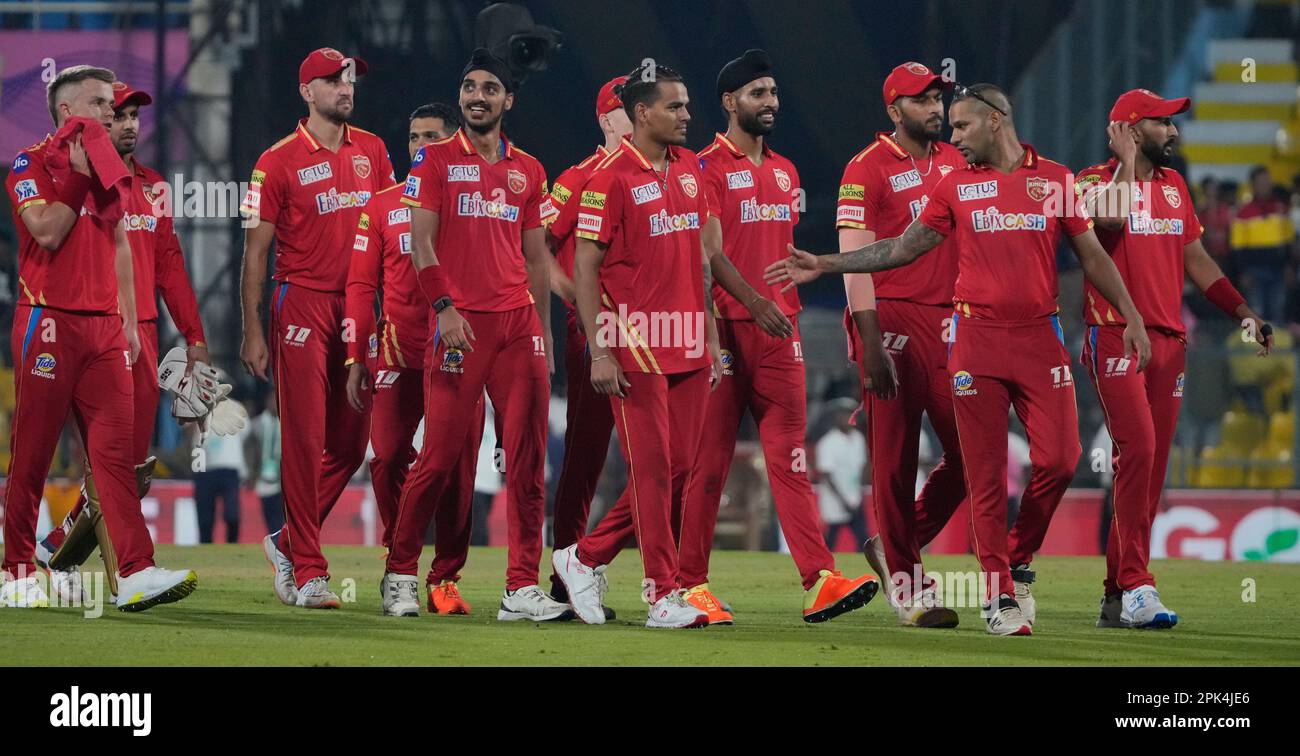Punjab Kings' captain Shikhar Dhawan, second left, with his team walks ...