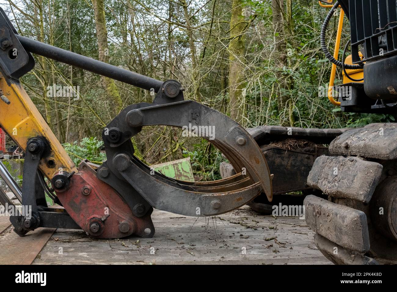 Digger on back of lorry waiting to be unloaded Stock Photo - Alamy