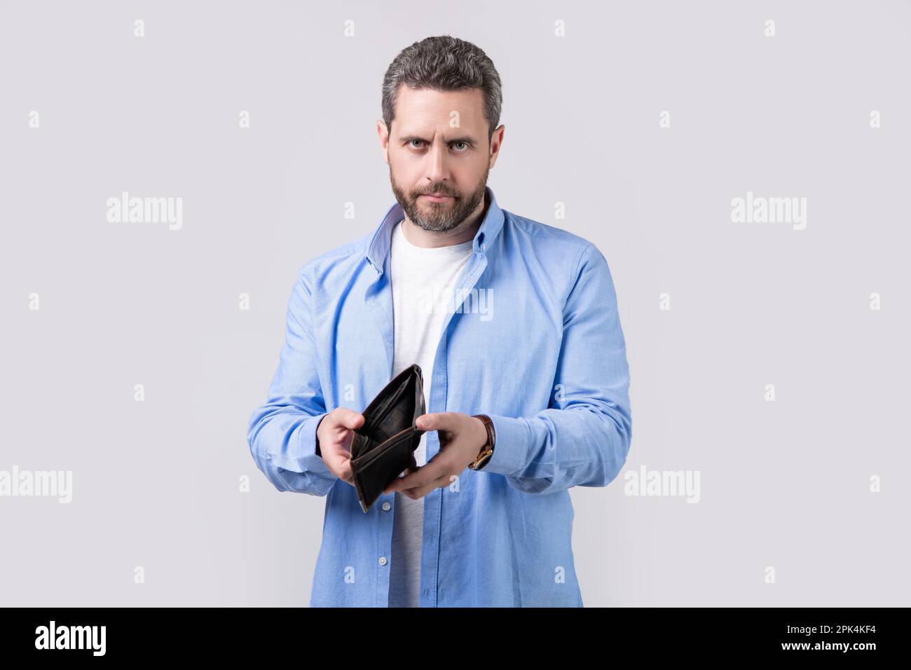photo of poor broke man with wallet. broke man with wallet isolated on ...
