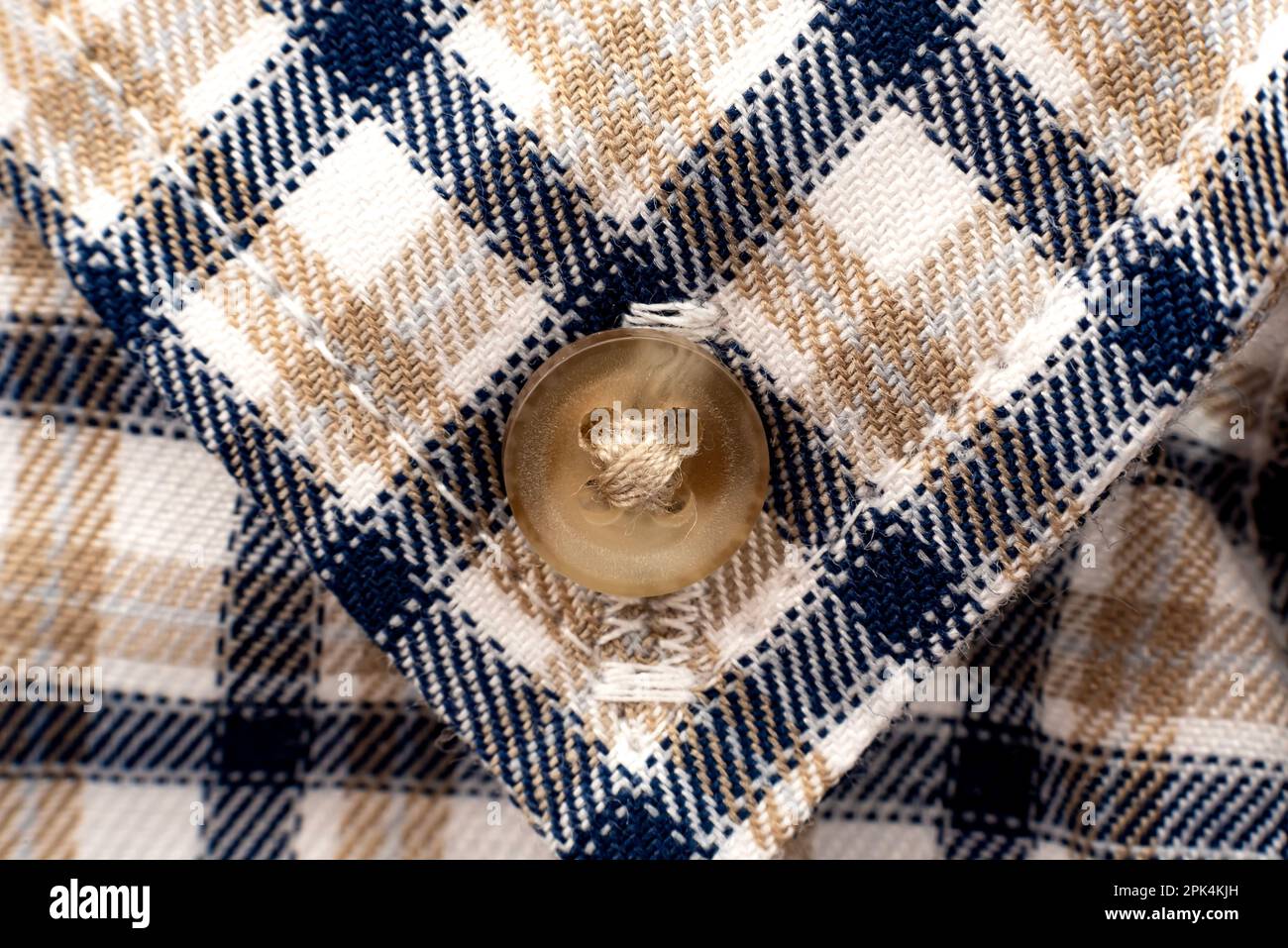 Men's shirt. Plaid shirt sleeve with buttons. Piece of clothing. Button ...