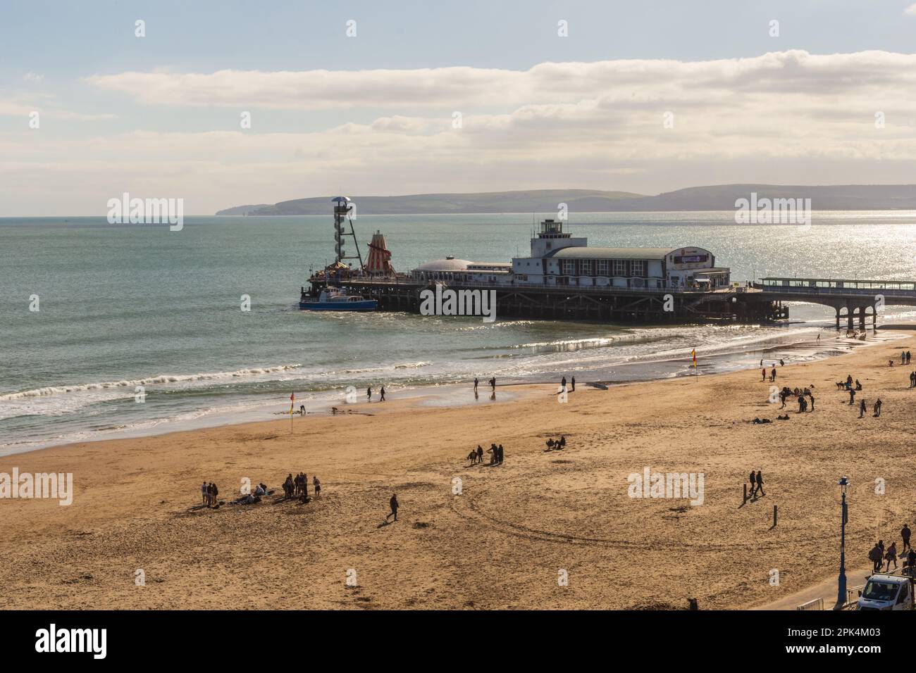 Bournemouth, UK - April 2nd 2023: People on the beach in front of the ...