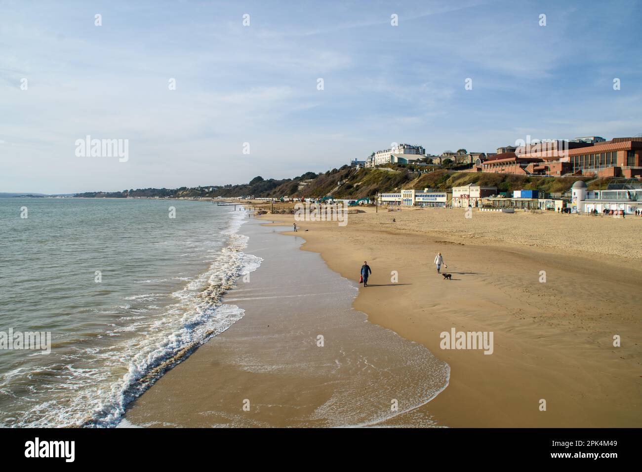 Bournemouth, UK - February 10th 2023: Two people on an empty ...