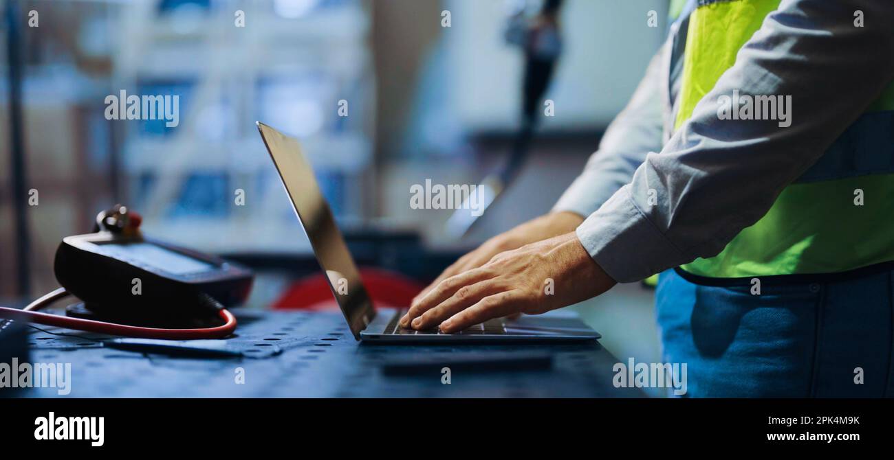 Programming robot controller, Programming robotic arms in factory industrial Stock Photo - Alamy