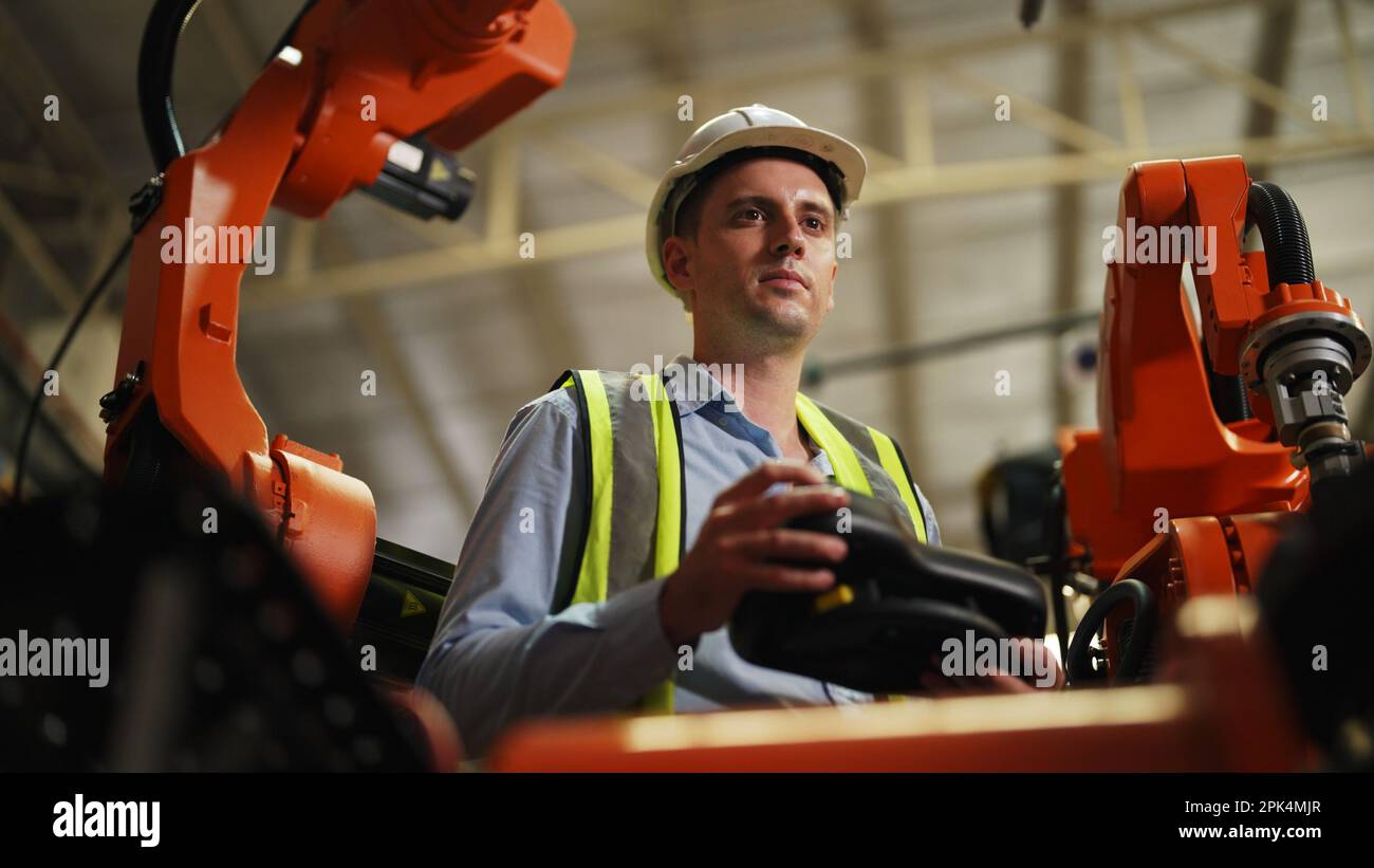 Professional male industrial engineer manager with safety uniform ...