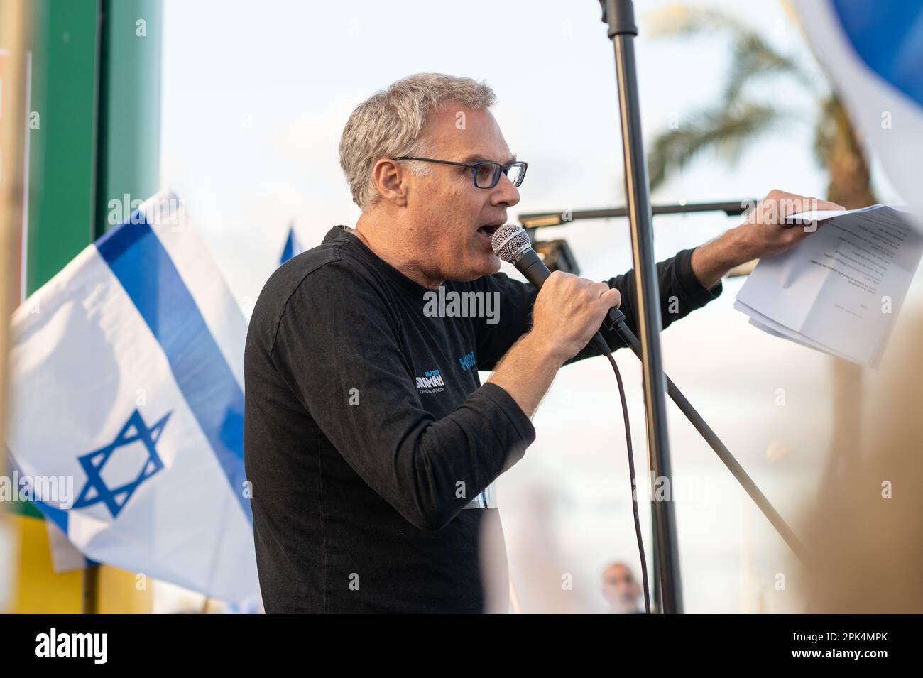 Israelis collect outside a shopping centre at Mishmar HaSharon for ...