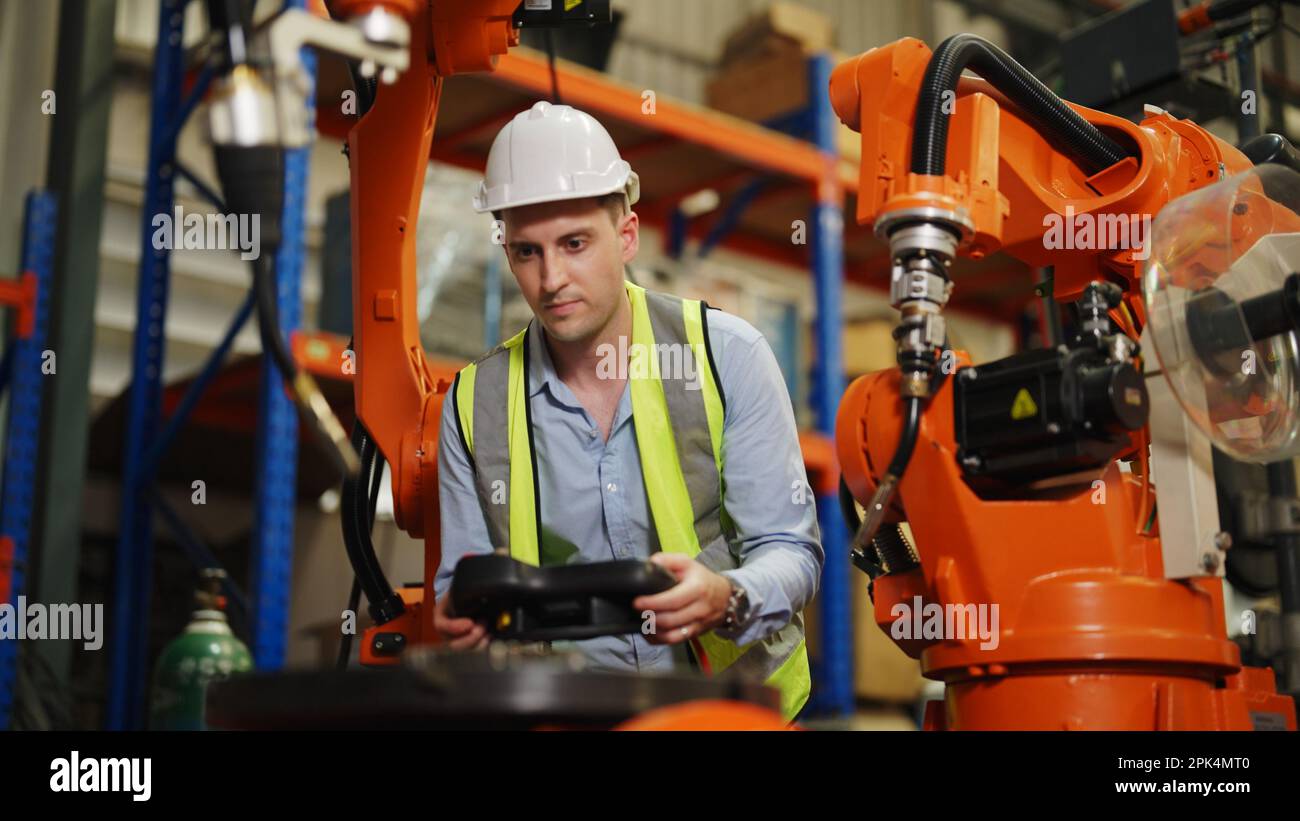 Professional male industrial engineer manager with safety uniform ...