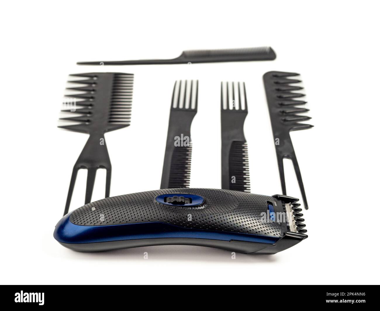 Hair clipper and combs isolated on white background. Modern hair ...